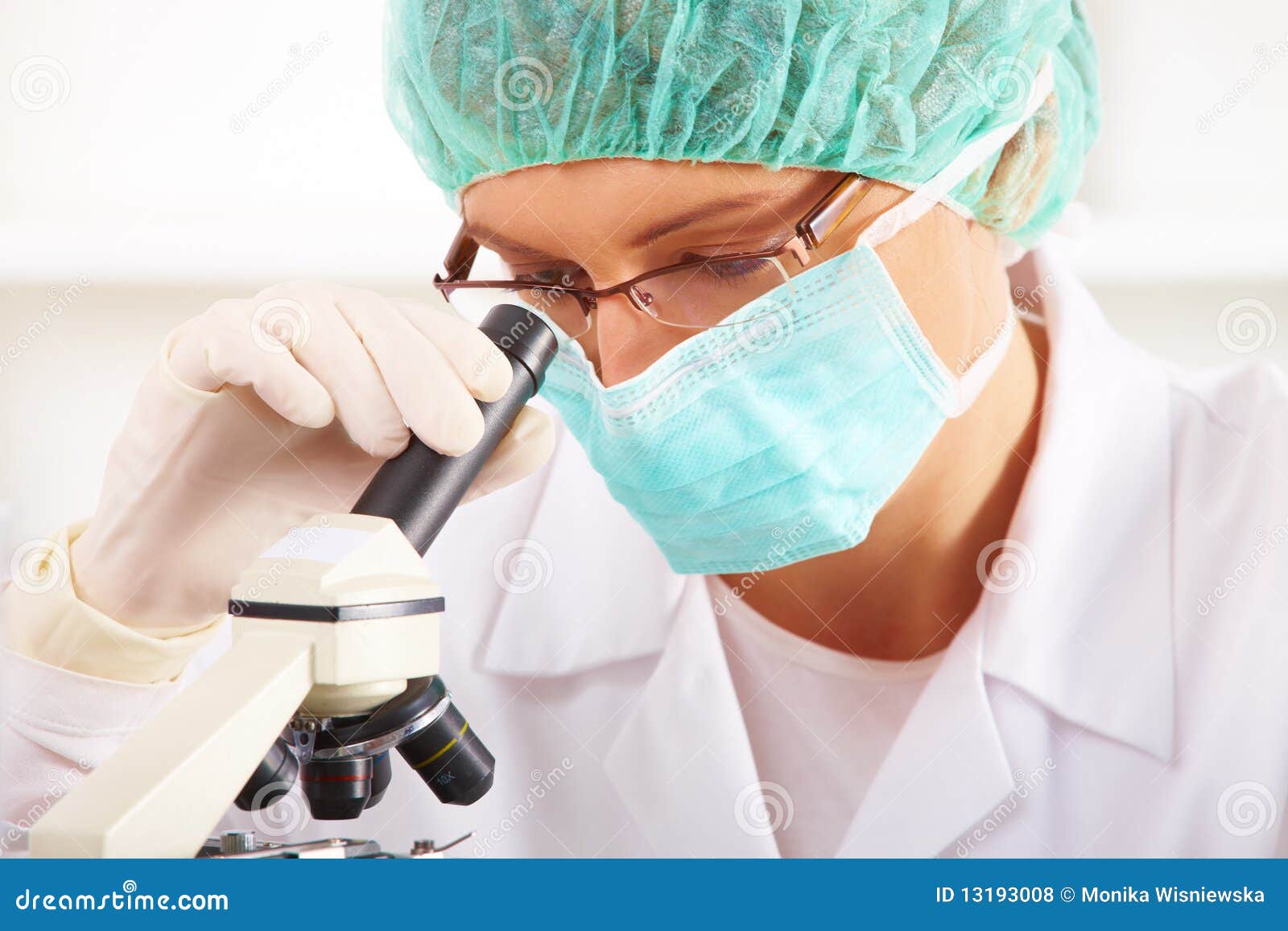 Researcher Using a Microscope in a Laboratory Stock Photo - Image of ...