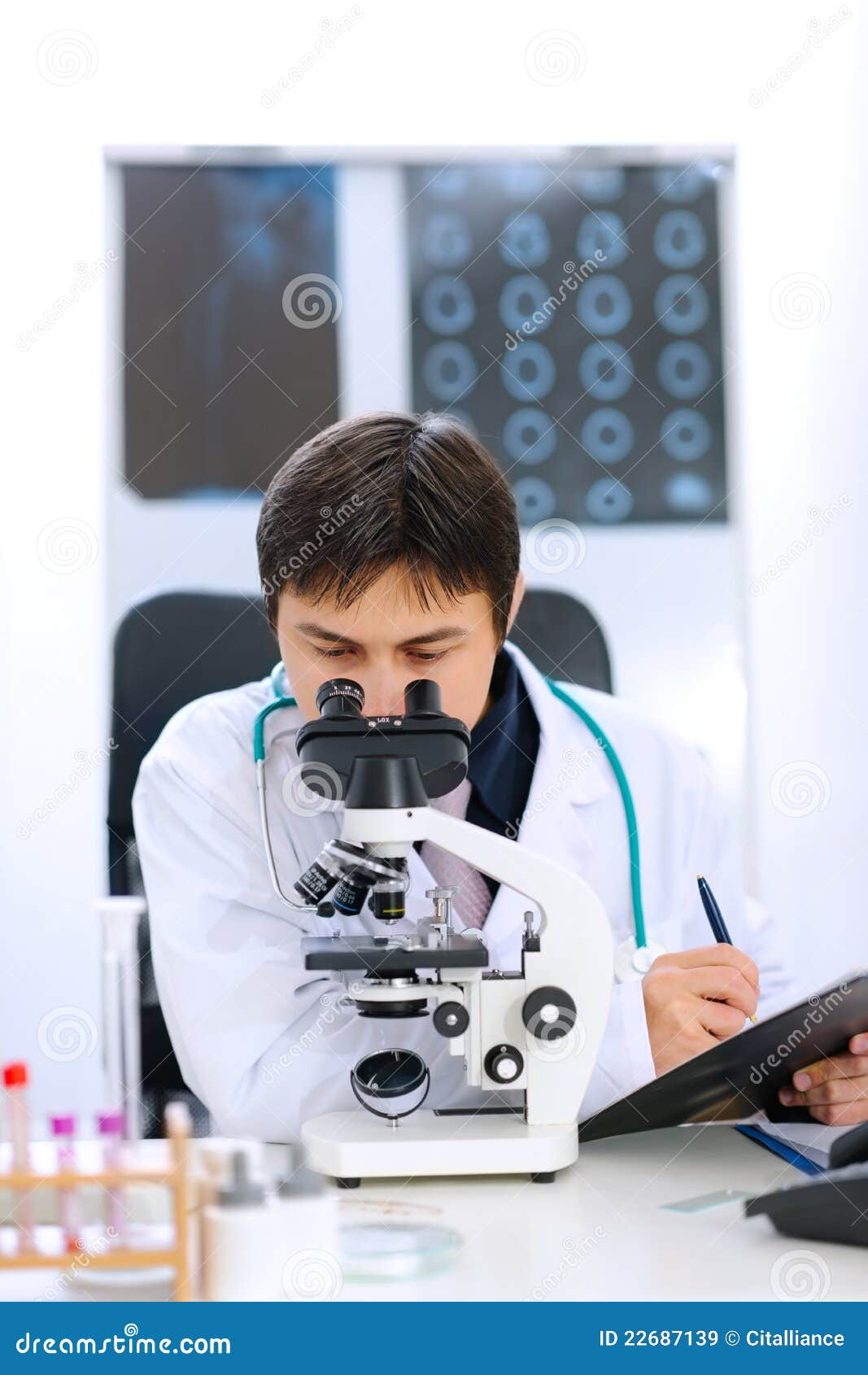 Researcher Using Microscope in Medical Laboratory Stock Image - Image ...