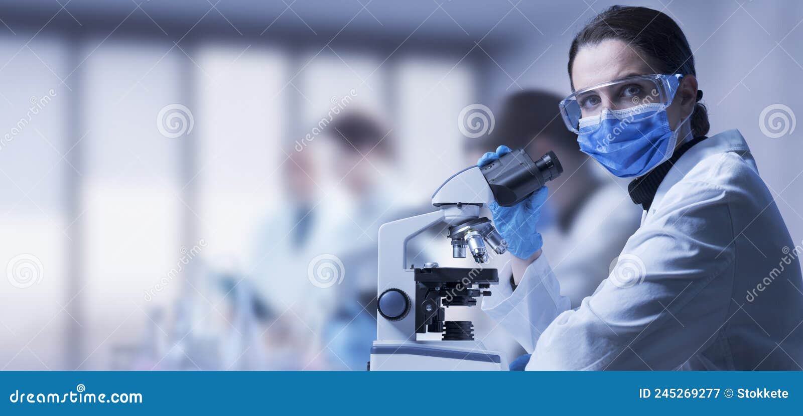 Researcher Using a Microscope Stock Image - Image of looking, discovery ...