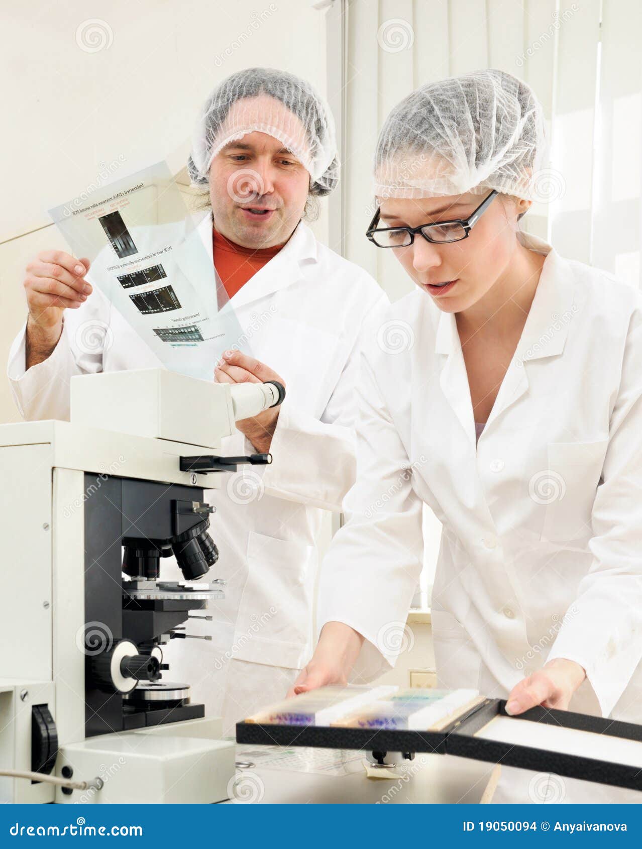 Researchers Analyzing Scientific Data Stock Photo - Image of people ...