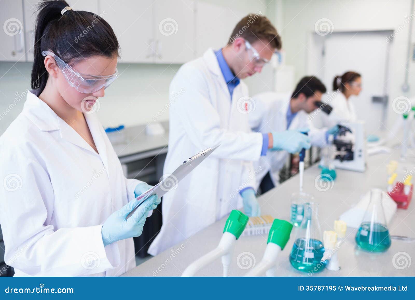 Researchers Carrying Out Experiments in the Lab Stock Image - Image of ...