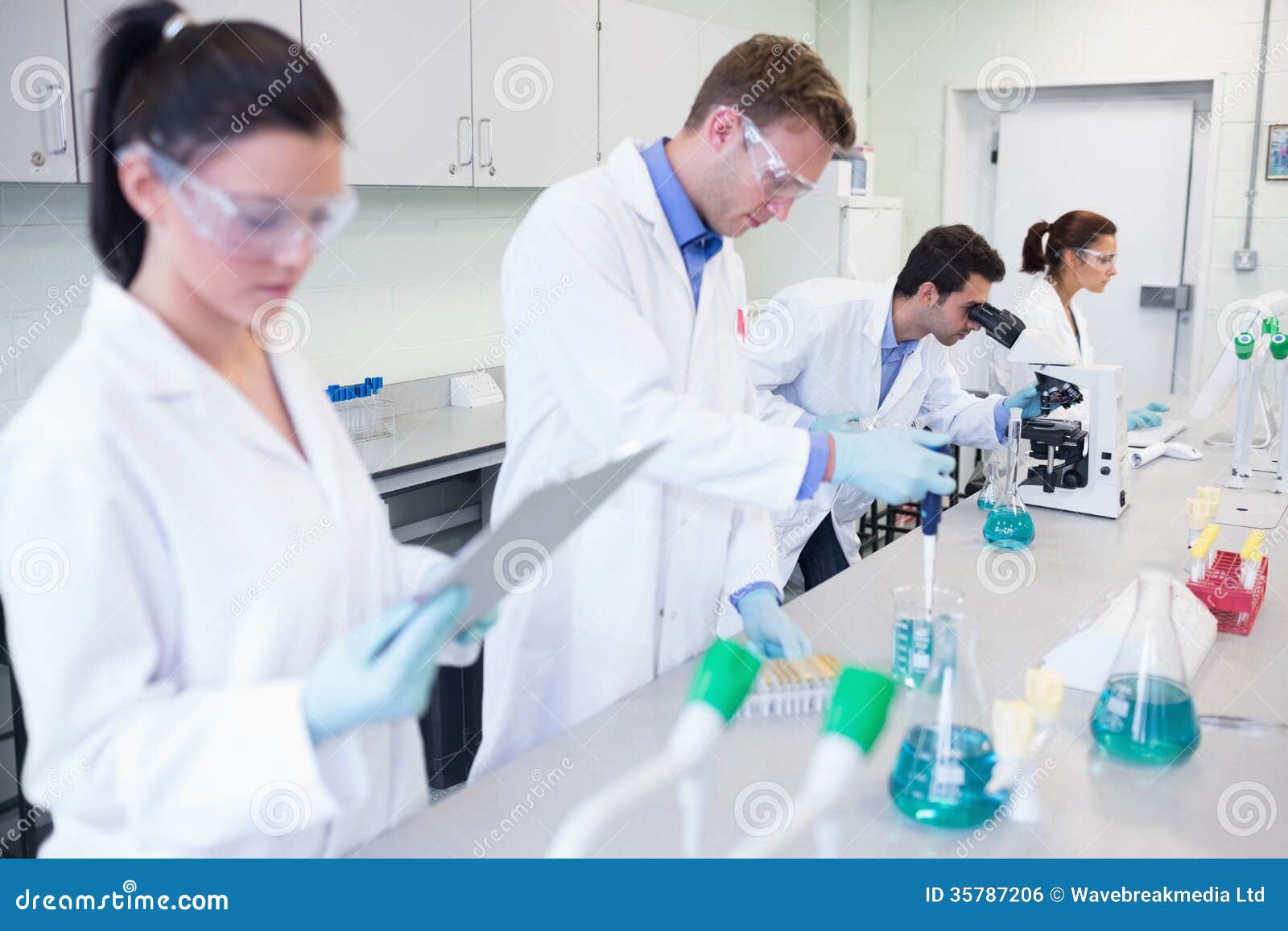Researchers Carrying Out Experiments in the Lab Stock Photo - Image of ...