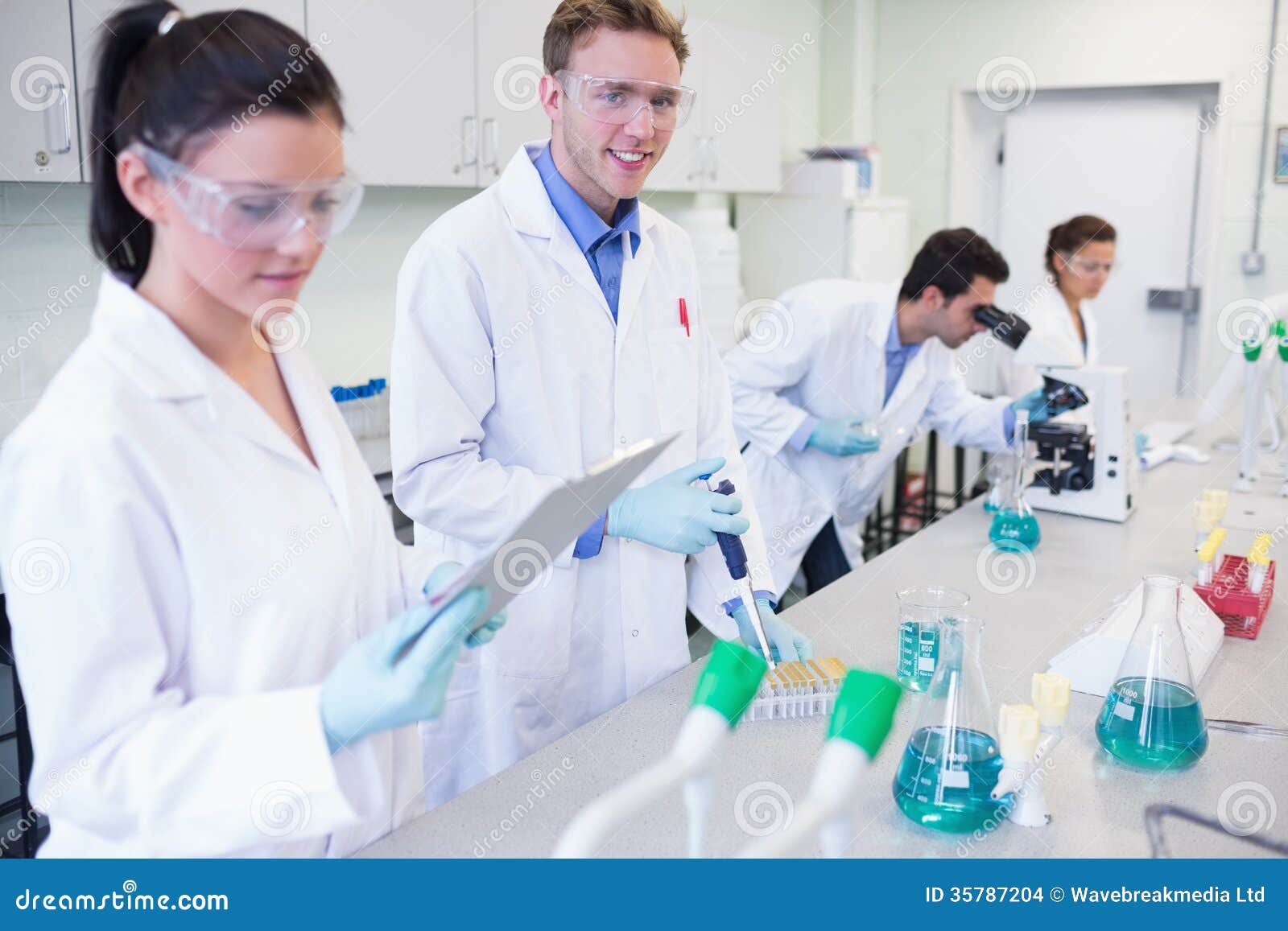 Researchers Carrying Out Experiments in the Lab Stock Photo - Image of ...