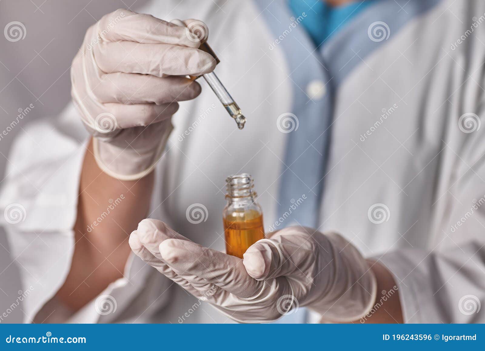 Researchers Hand Mixing Solution from Pipette in Bottle Stock Photo ...