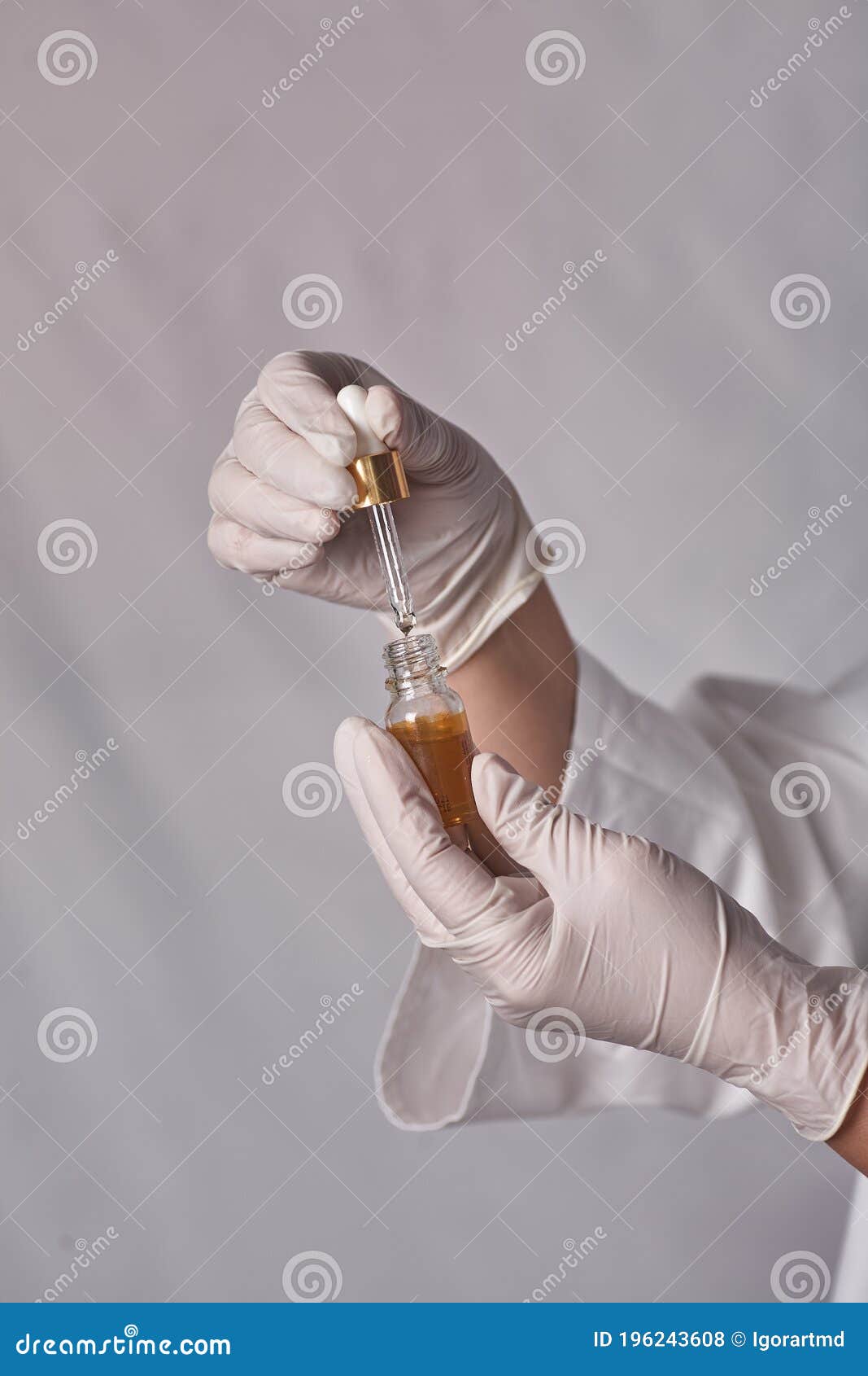 Researchers Hand Mixing Solution from Pipette in Bottle Stock Photo ...