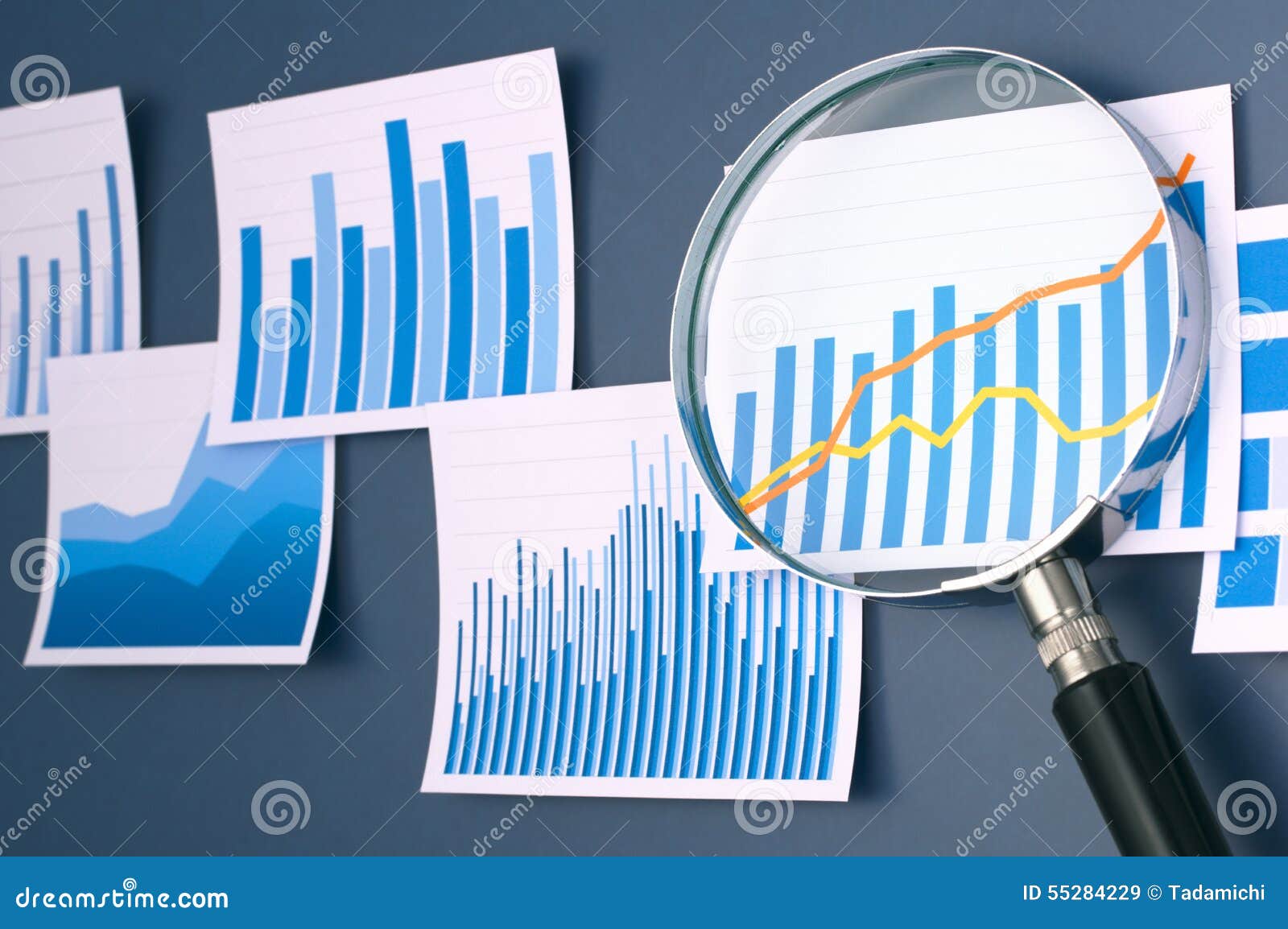 Researching and Analyzing Data with Magnifying Glass. Stock Image ... Researching and Analyzing Data with Magnifying Glass. Stock Image ...