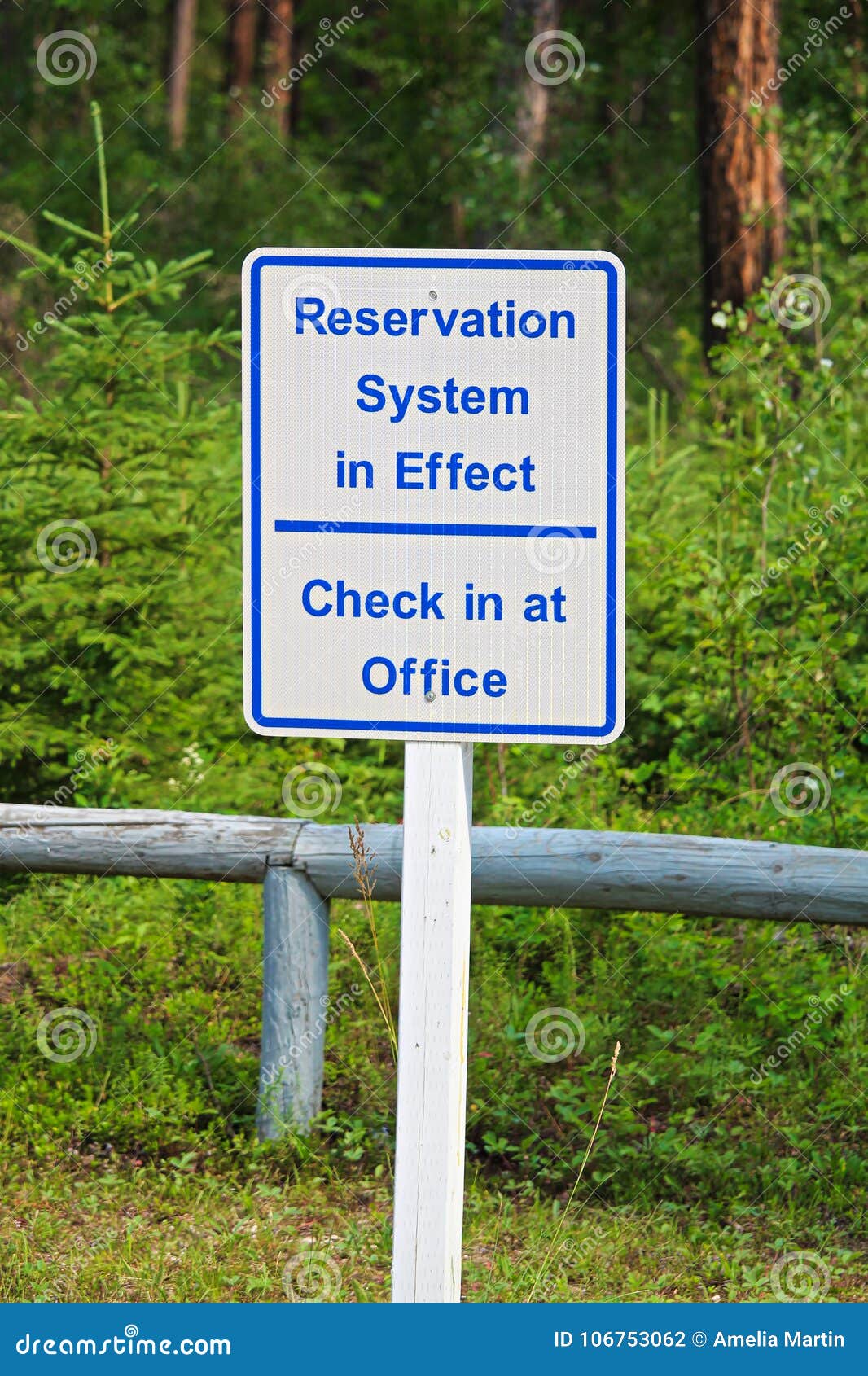 A Reservation System in Effect Sign, Check in at Office Stock Photo ...