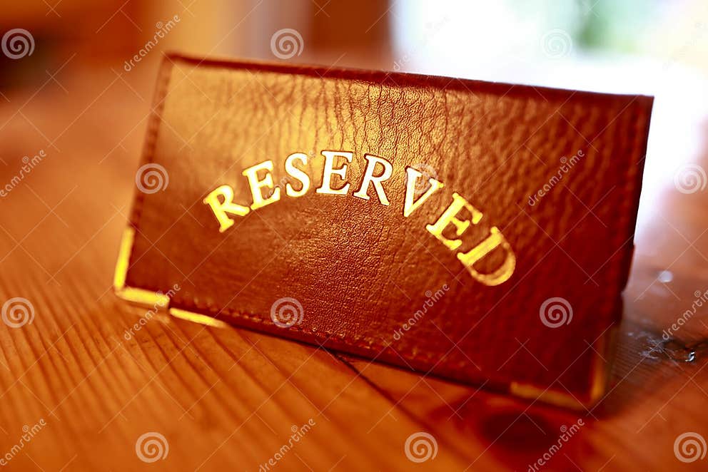 Reserved Badge Embossed on Leather Base Stock Photo - Image of note ...