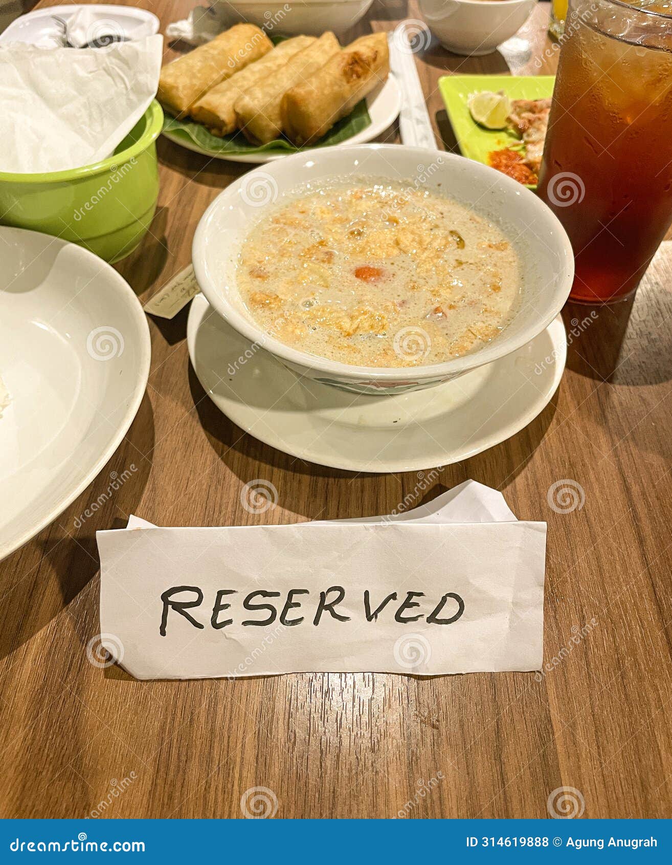 Reserved Sign on Table in Restaurant with Served Food Stock Photo ...
