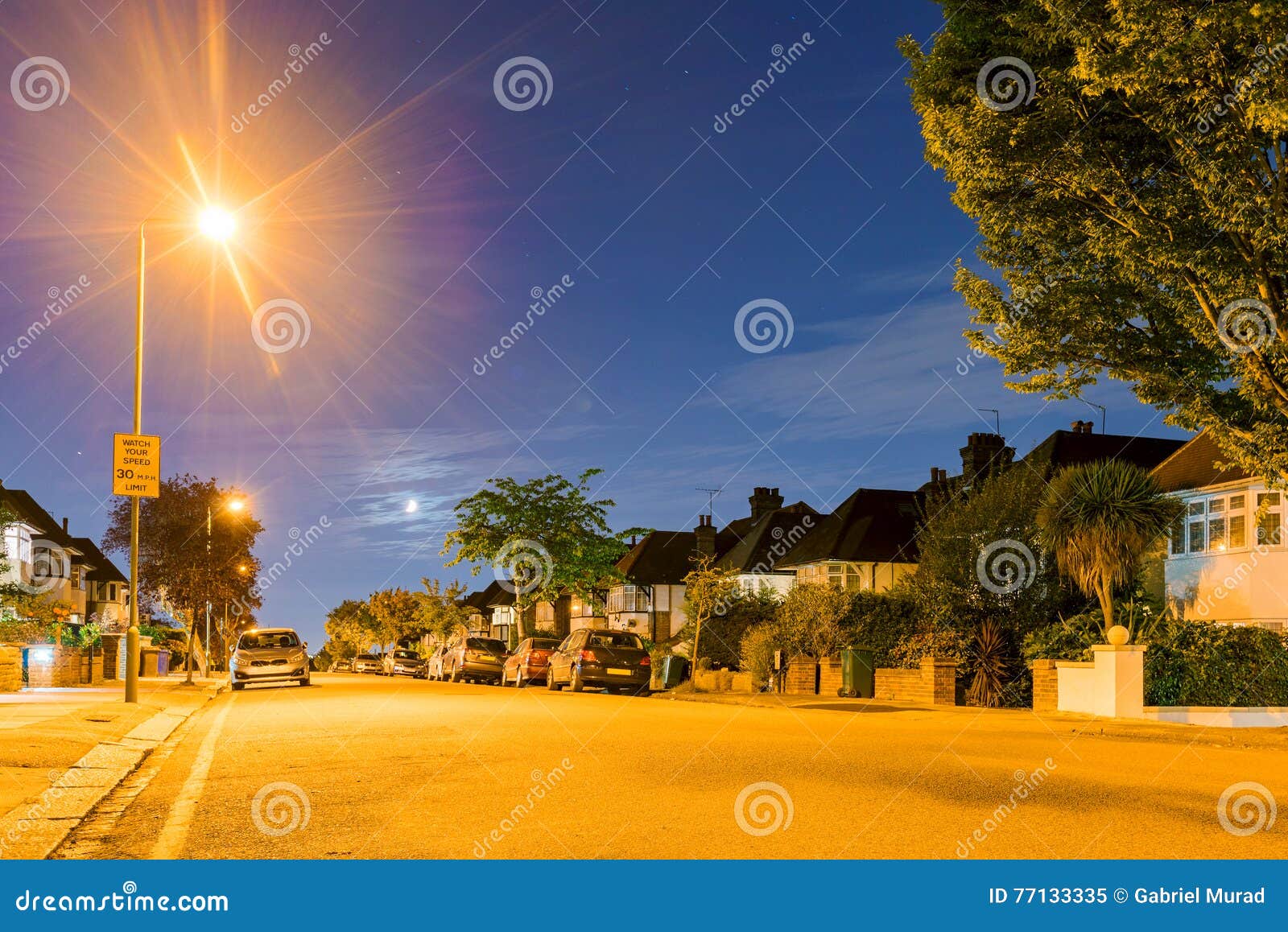 Residential area at night stock image. Image of property - 77133335