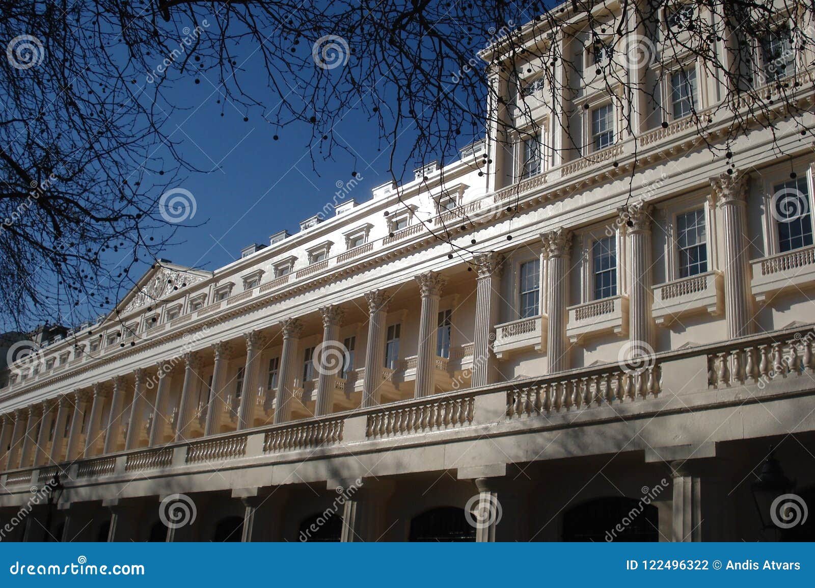 Residential Building Facade with Multiple White Columns and Sash ...