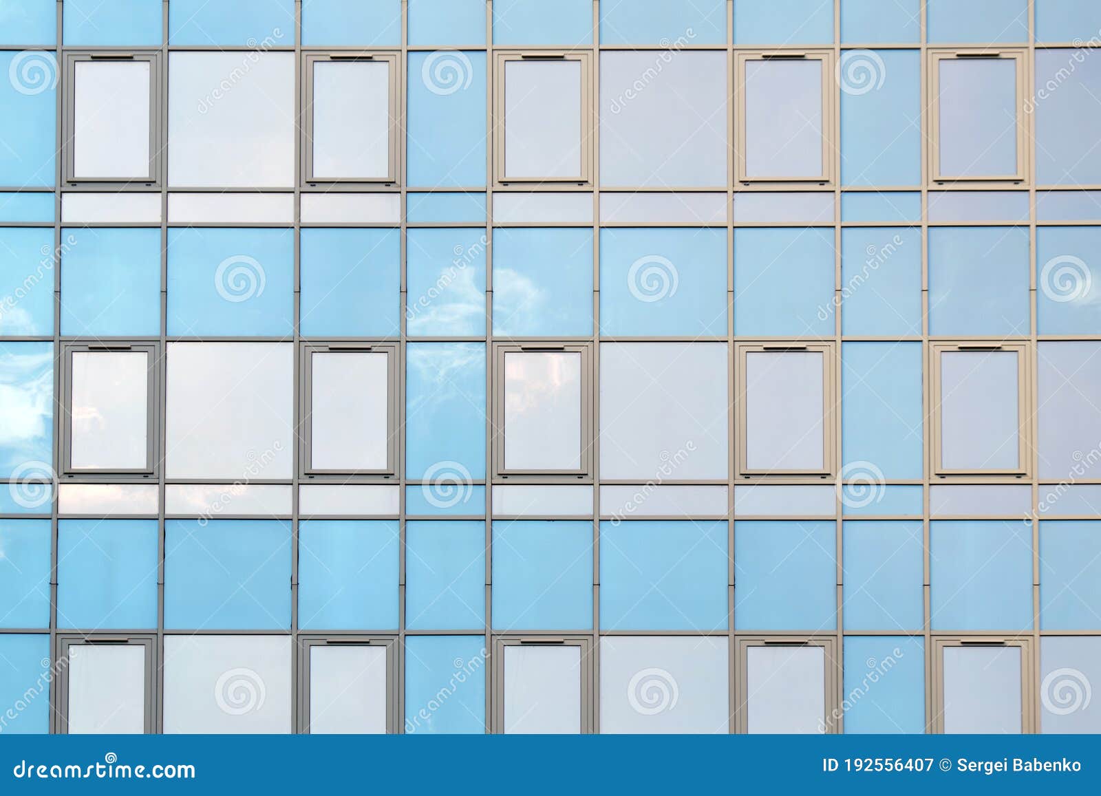 Residential Complex with Large Mirrored Windows on the Facade with a ...