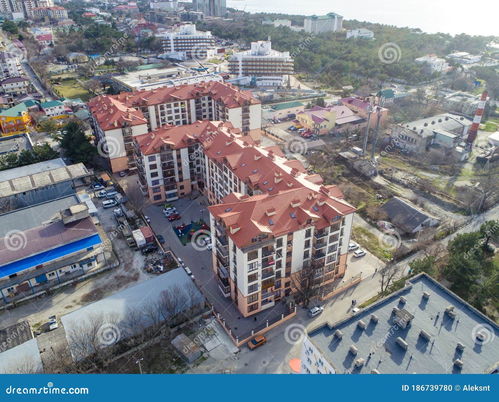 Residential Complex of Three Multi-storey Buildings with Red Roofs. the ...
