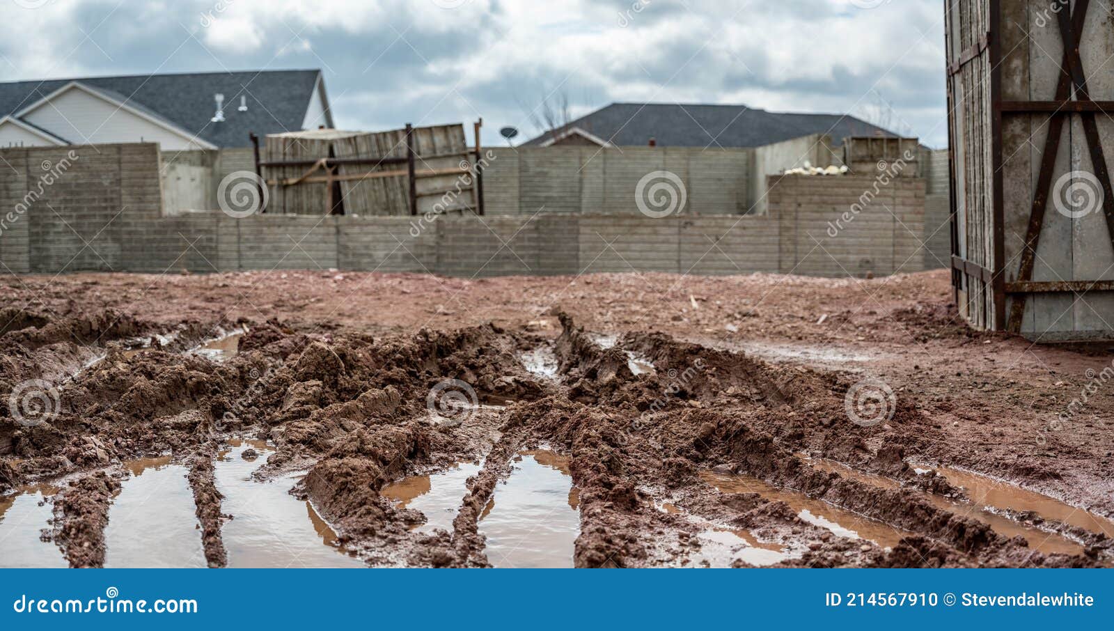 Residential House Construction Under Rain Delay with Mud and Tracks ...