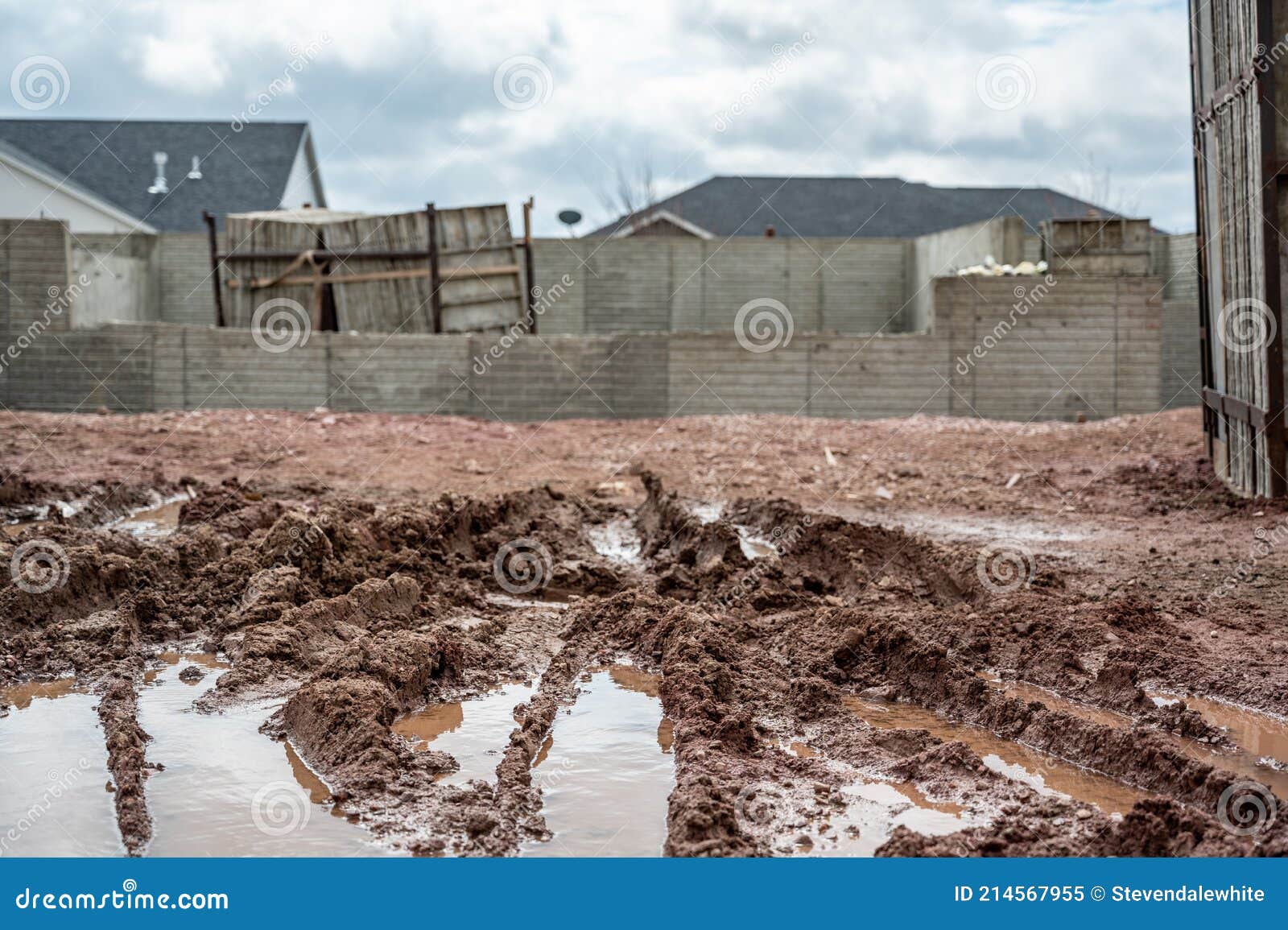 Residential House Construction Under Rain Delay with Mud and Tracks ...