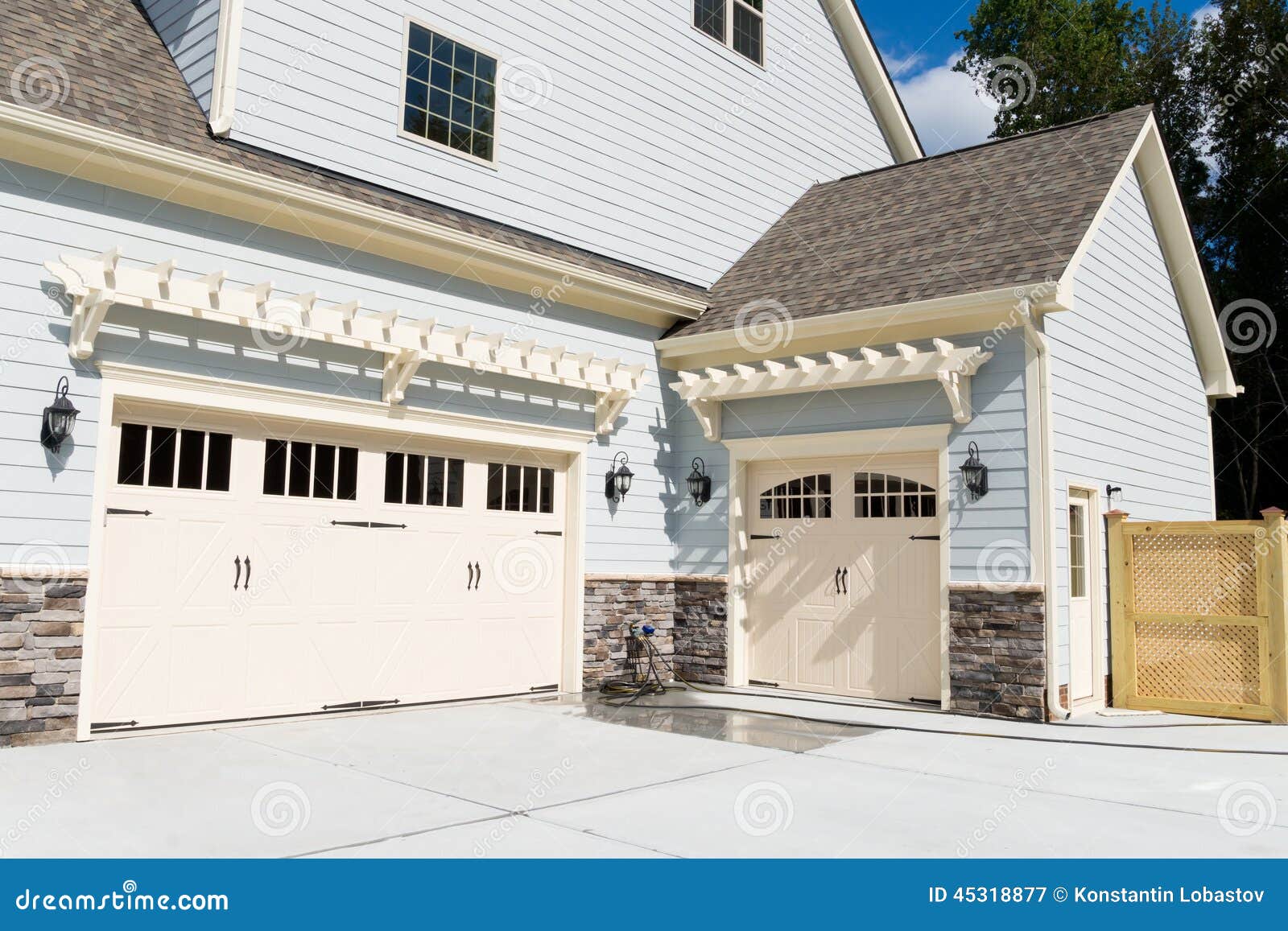 Residential House Three Car Garage Doors Stock Image - Image of doors ...