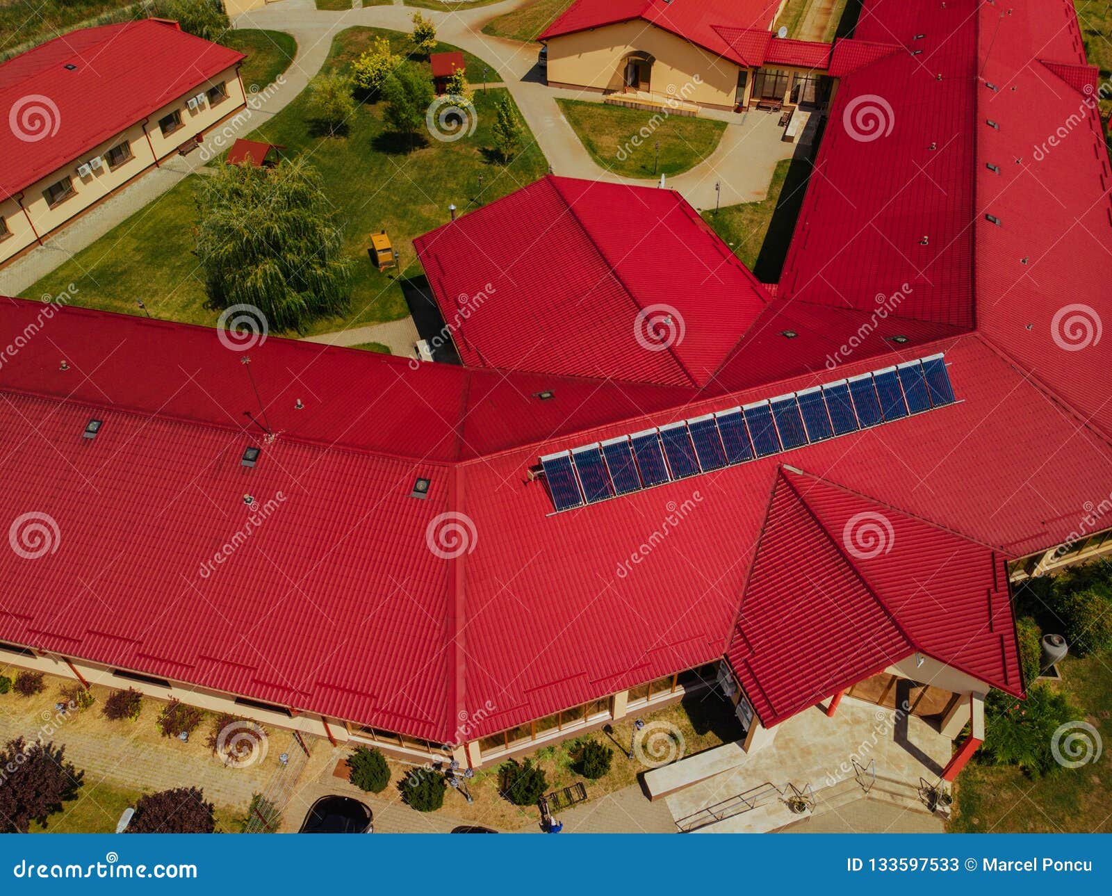 Residential Red Roof Tile with with Solar Panels Stock Image - Image of ...