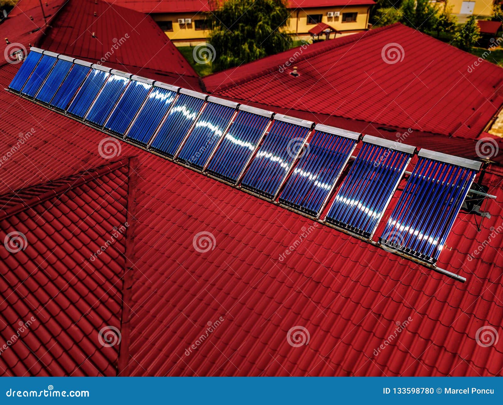 Residential Red Roof Tile with with Solar Panels Stock Photo - Image of ...