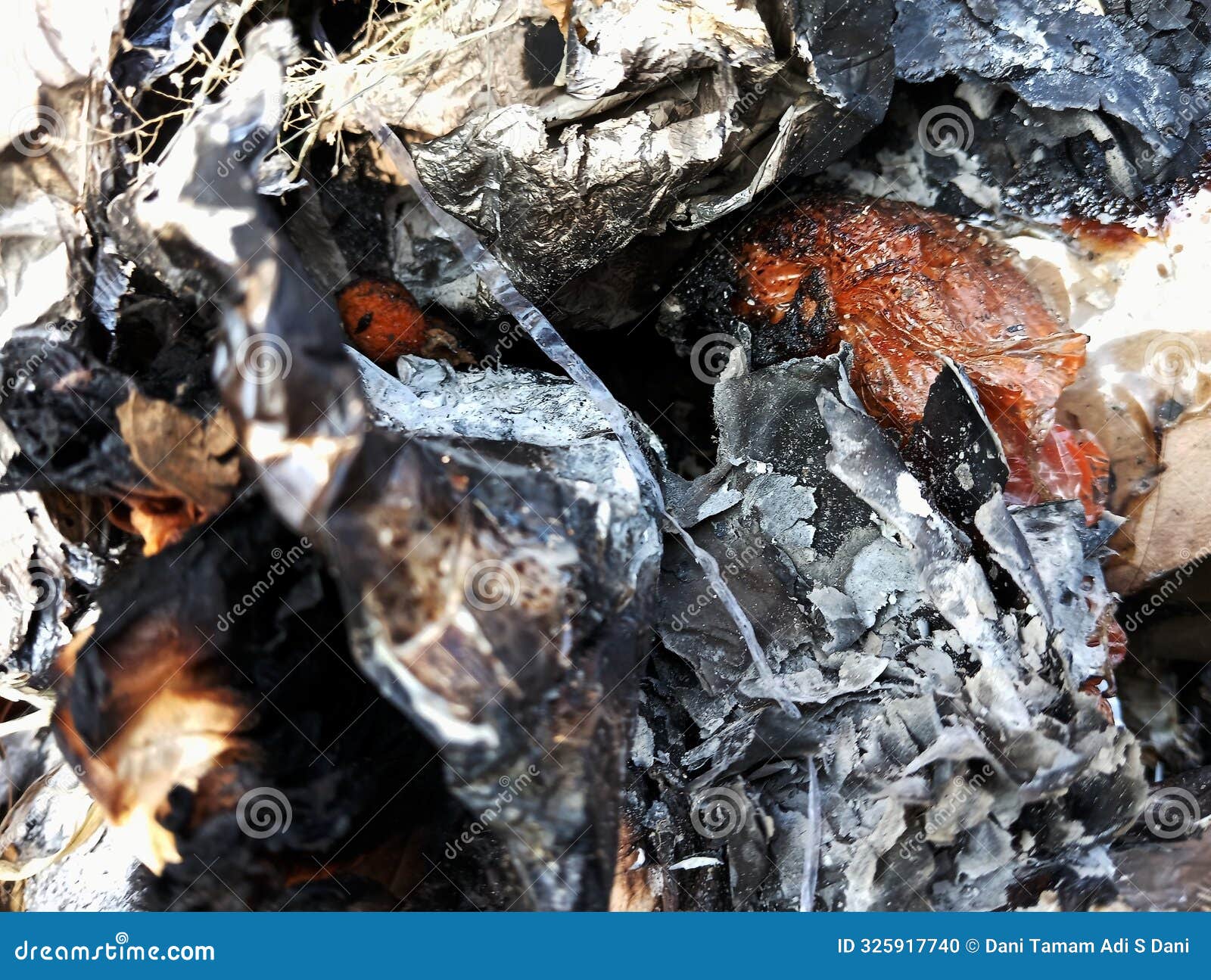 Residue from Burning Plastic Waste Next To the House. Stock Photo ...