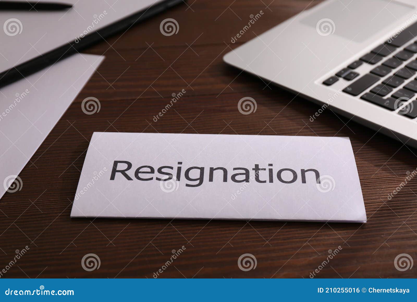 Resignation Letter on Wooden Table in Office Stock Photo - Image of ...