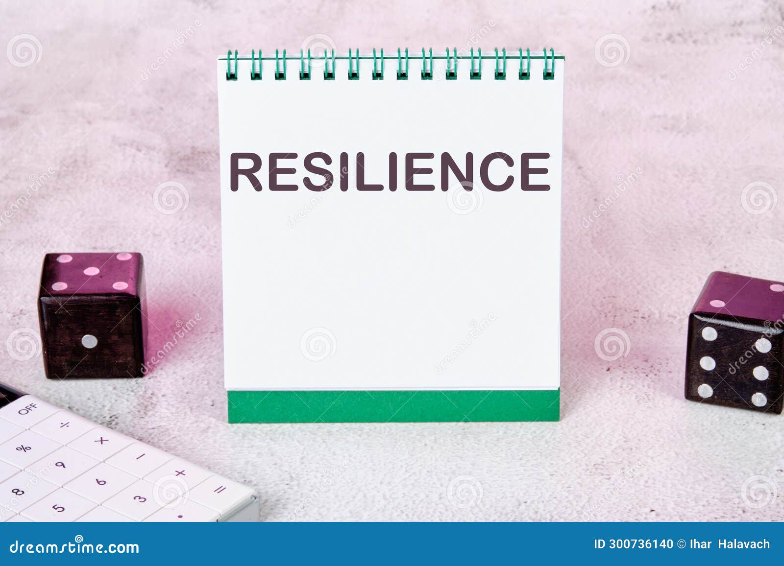 RESILIENCE Text on a White Notepad Sheet Next To Dice on an Abstract ...