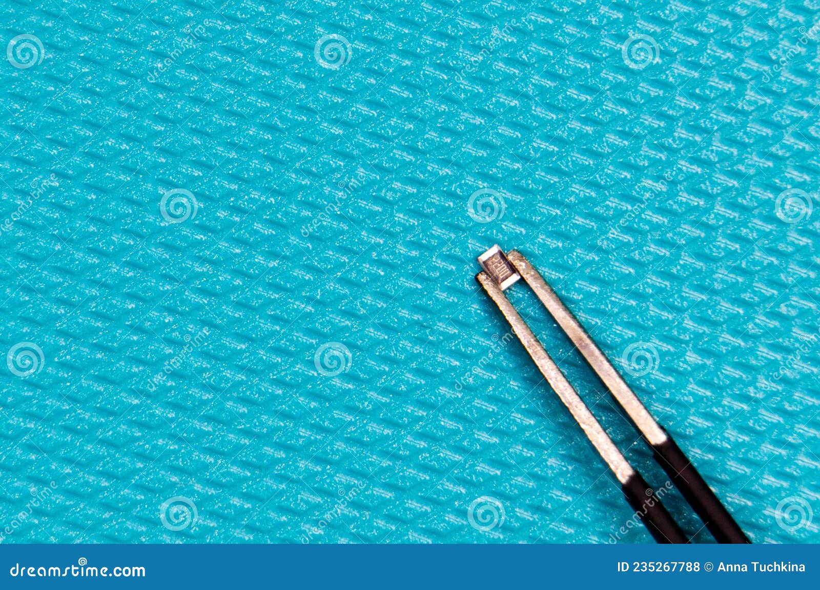 220? Resistor and Tweezers on a Blue Background Stock Photo - Image of ...