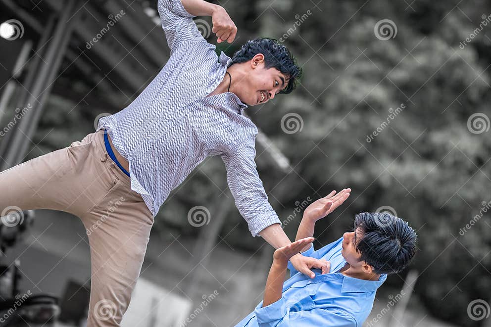 Resolve a Problem Like a Men. a Guy Punches Another Man in the Face ...