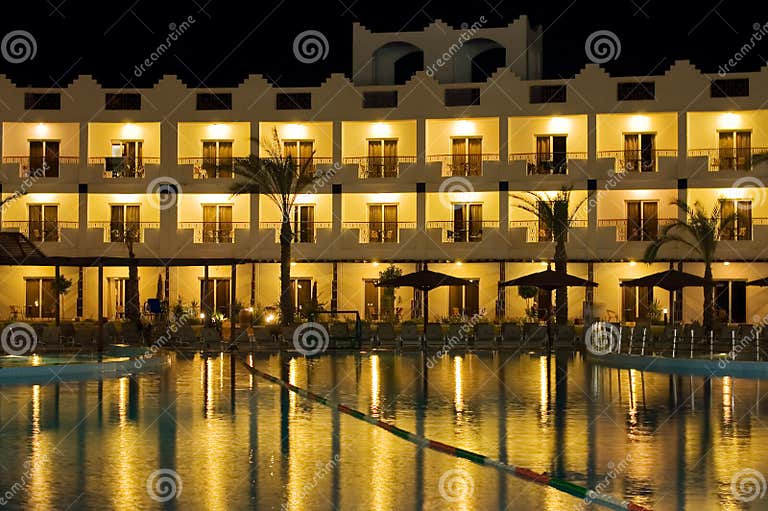 Resort hotel at night stock image. Image of private, pool - 16147061