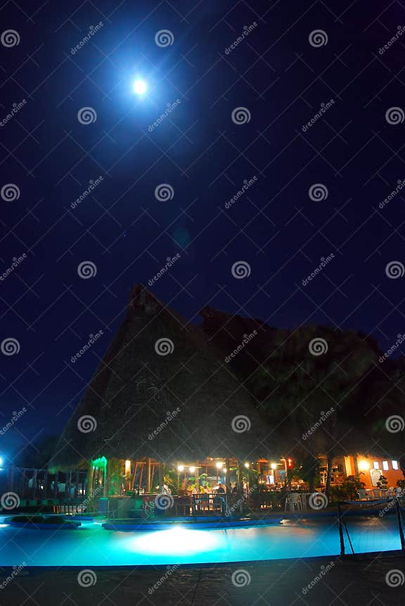 Resort Hotel/Pool at Night stock image. Image of resort - 5338203