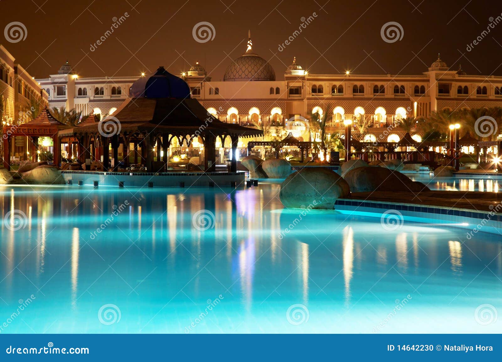 Resort pool at evening stock photo. Image of climate - 14642230