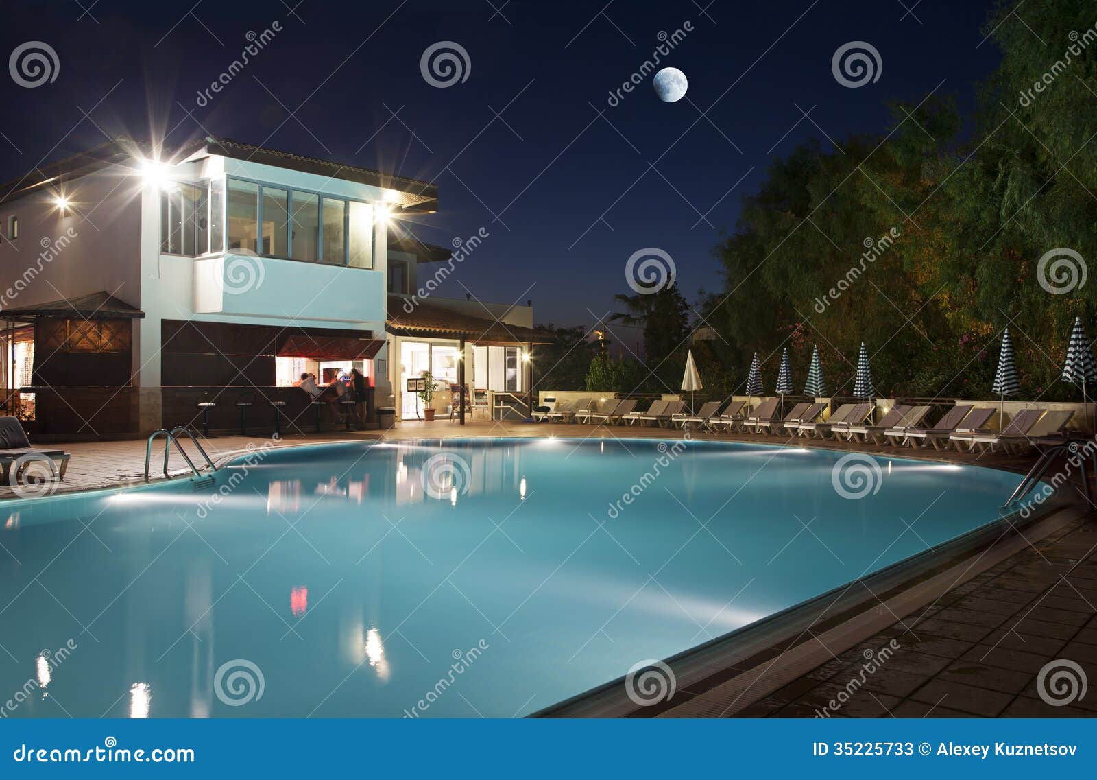 Resort pool at night stock image. Image of night, architecture - 35225733
