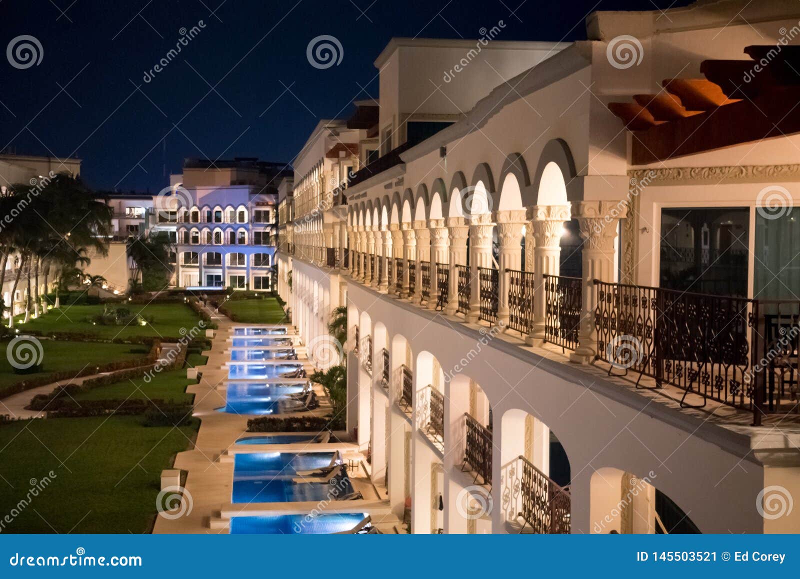 Resort pools at night stock image. Image of vacation - 145503521