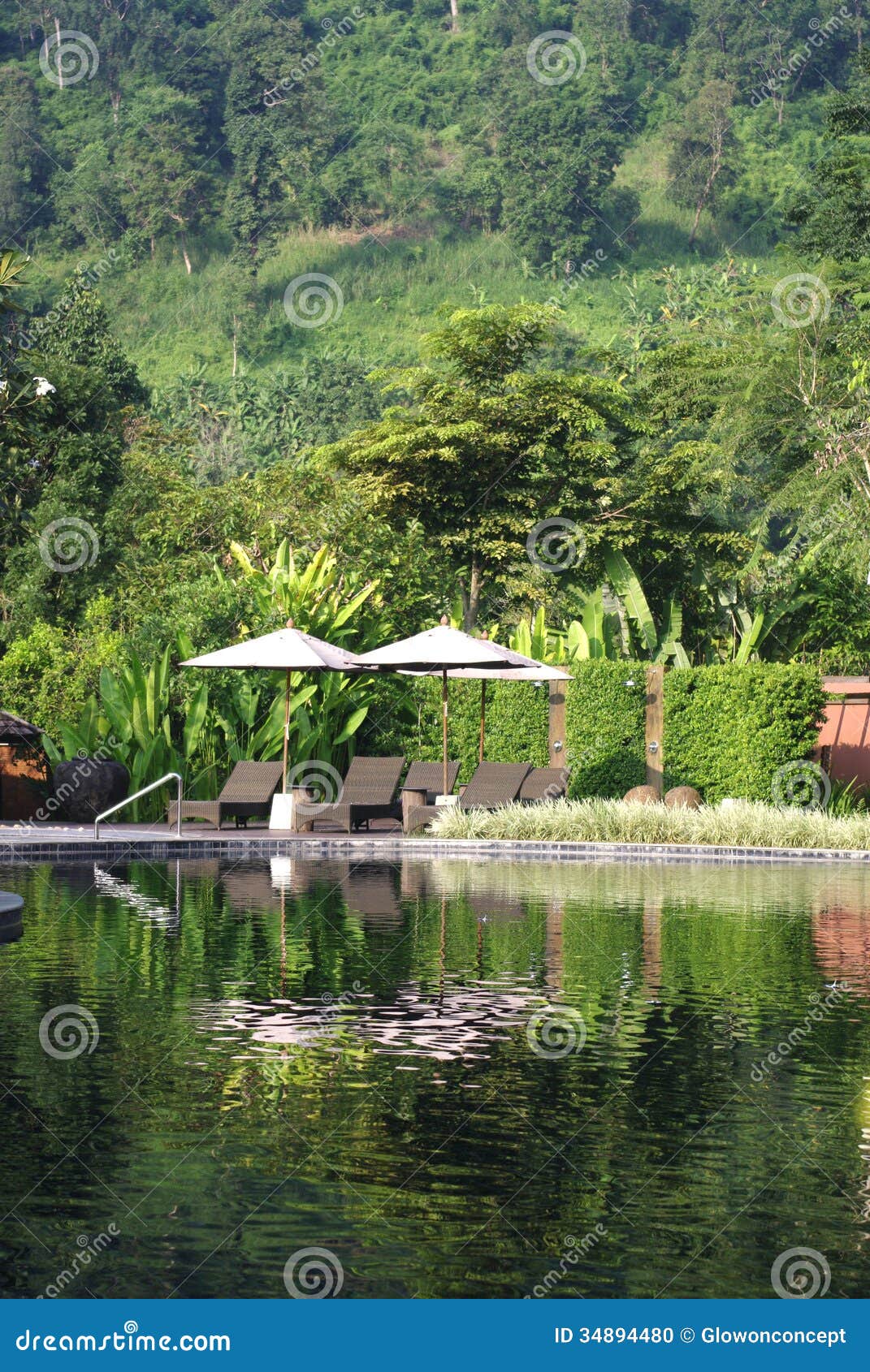 Resort swimming pool seat stock photo. Image of calm - 34894480