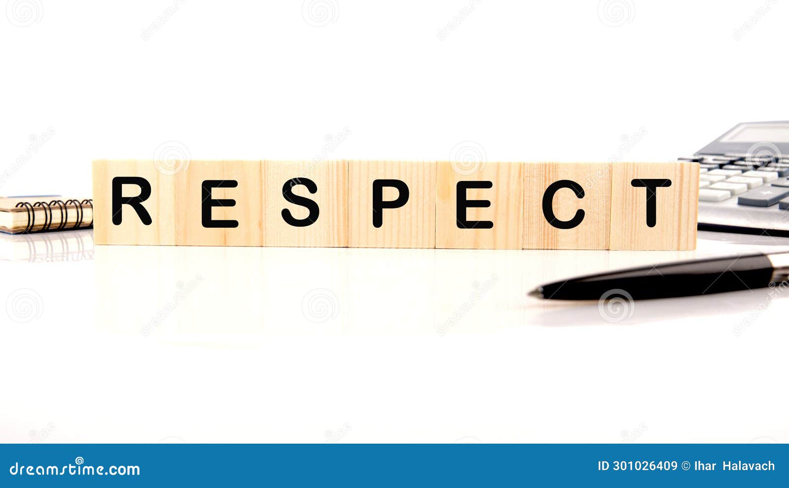 Respect Word Assembled from Wooden Cubes Next To a Calculator, Pen and ...
