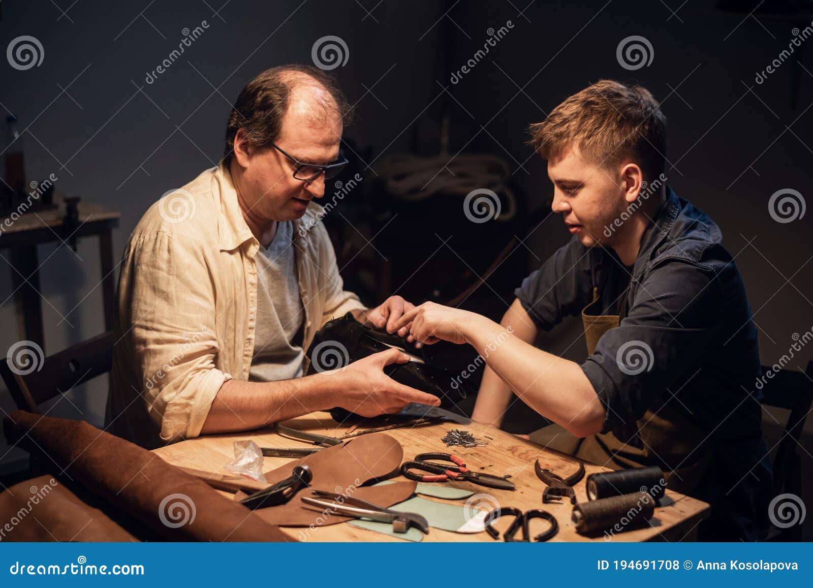 A Respectable Elderly Shoemaker Conducts a Master Class for a Young Boy ...