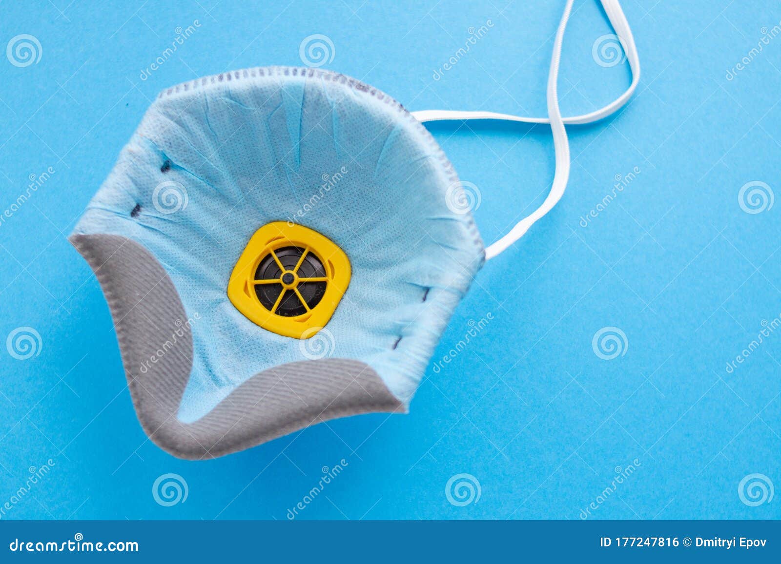 Respiratory Protective Respirator on a Blue Background Stock Photo ...
