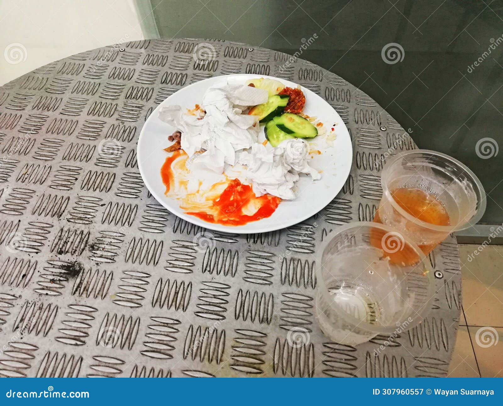 The Rest of Food Left on White Plate,on Metal Table Stock Image - Image ...