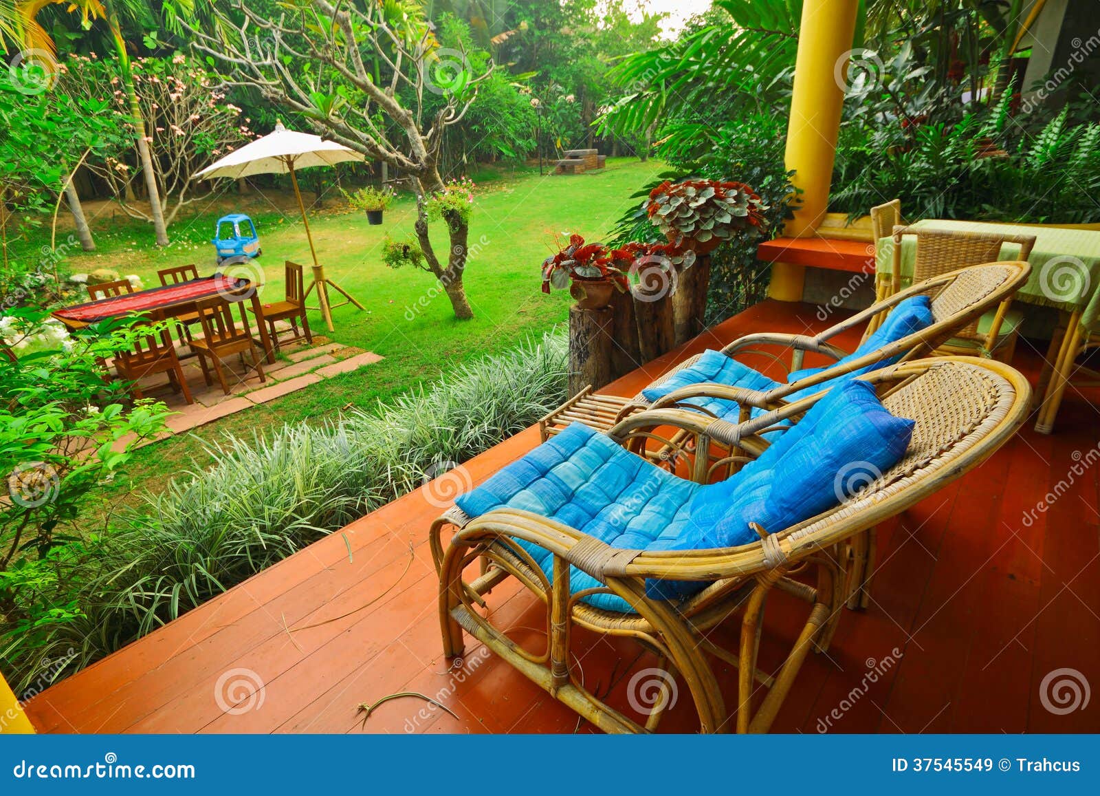 Rest and Relax among Floral Garden Stock Image - Image of veranda ...