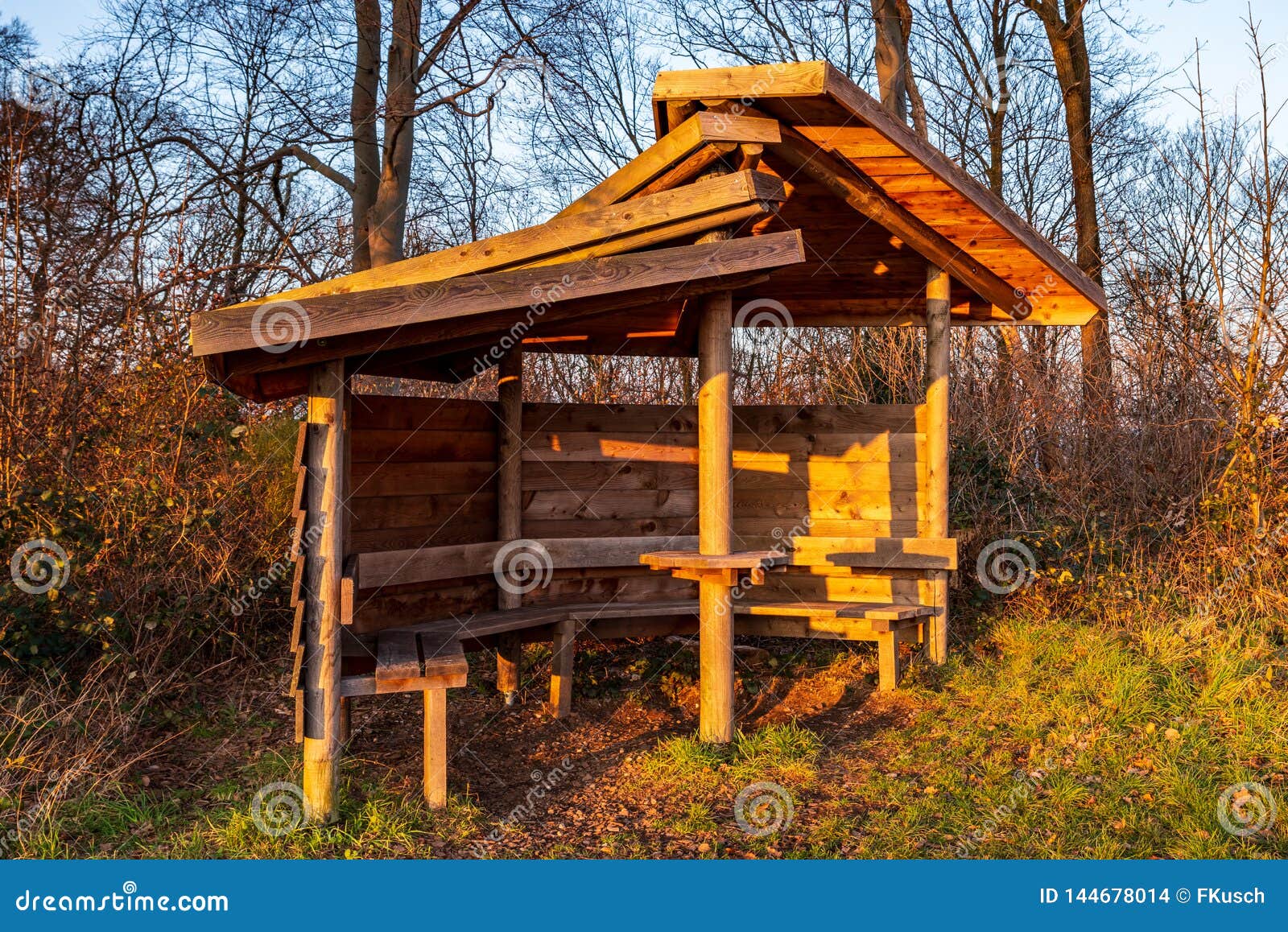 Rest Shelter for Hikers Along the Way in the Forest in the Evening Sun ...