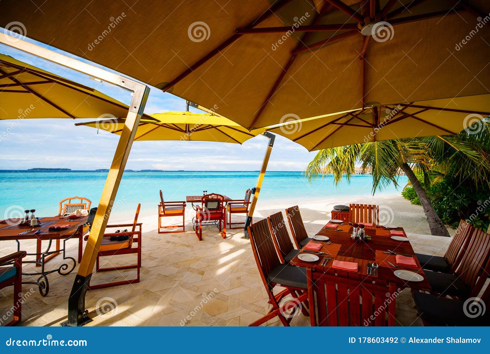 Restaurant at beach stock photo. Image of horizon, chair - 178603492
