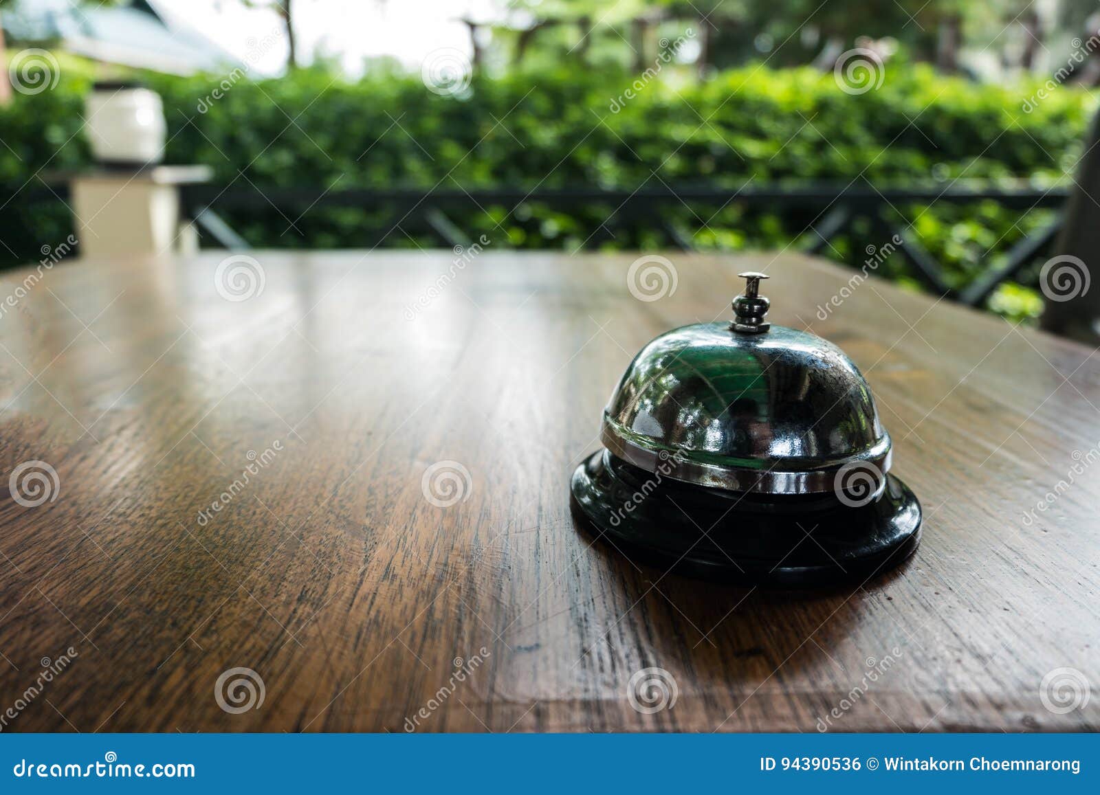 Restaurant bell on table stock photo. Image of counter - 94390536