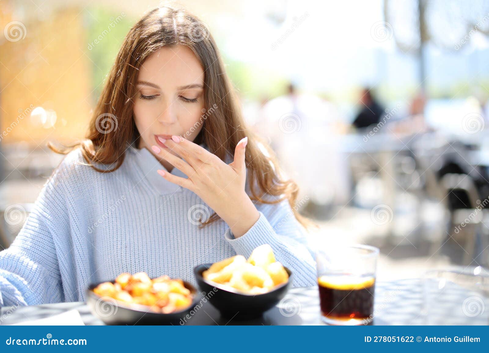Restaurant Customer Eating and Licking Finger Stock Photo - Image of ...