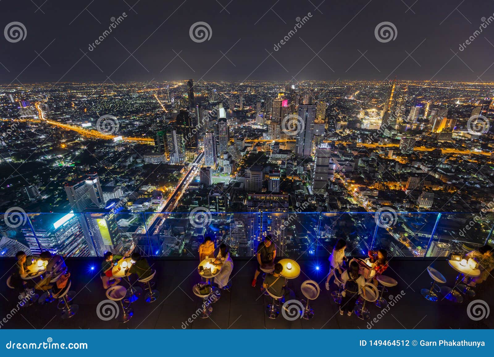 Restaurant Dining Table and View of Business Building on Terrace at ...