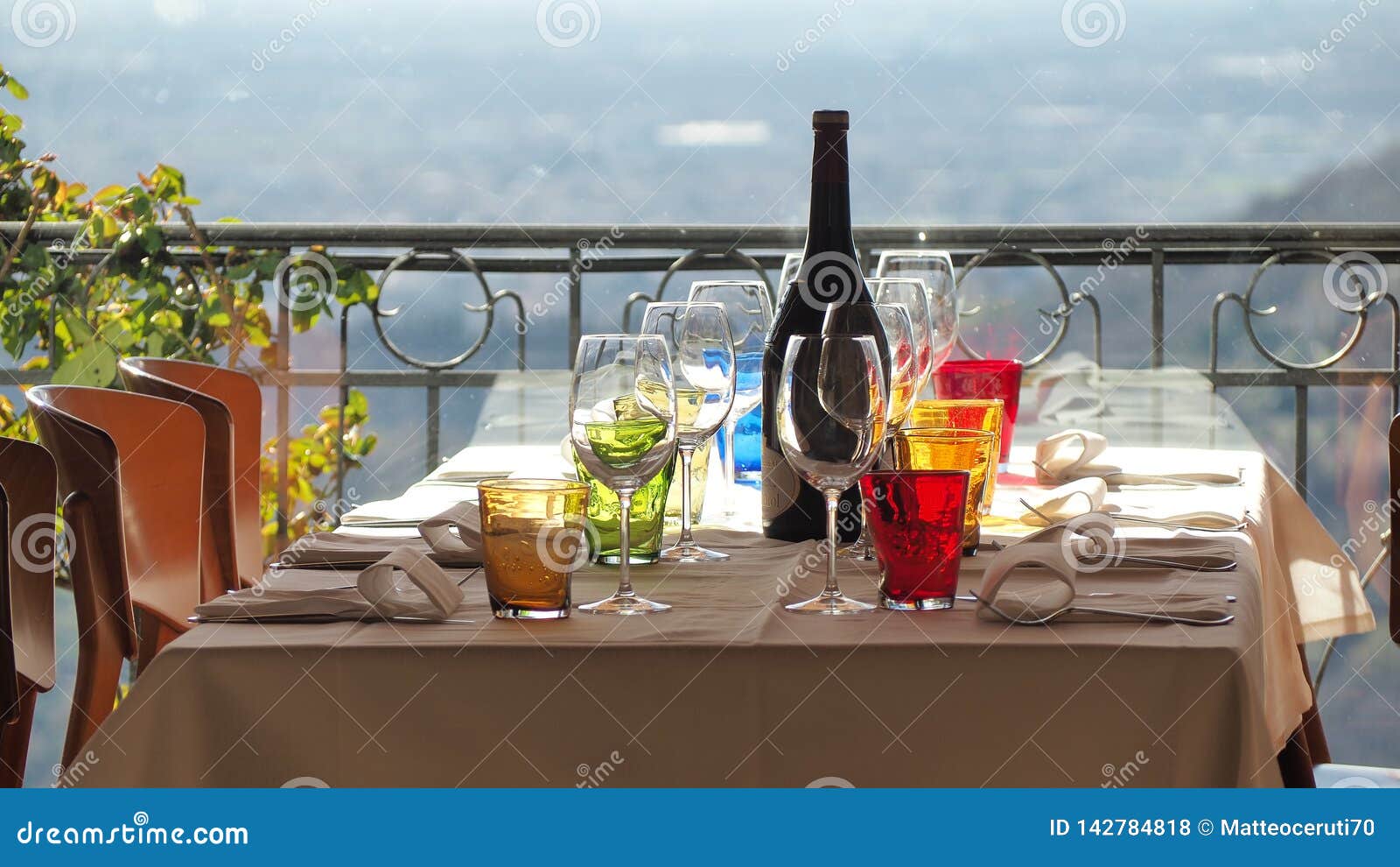 Restaurant with Elegant Table Set with Colored Glasses Editorial Stock ...
