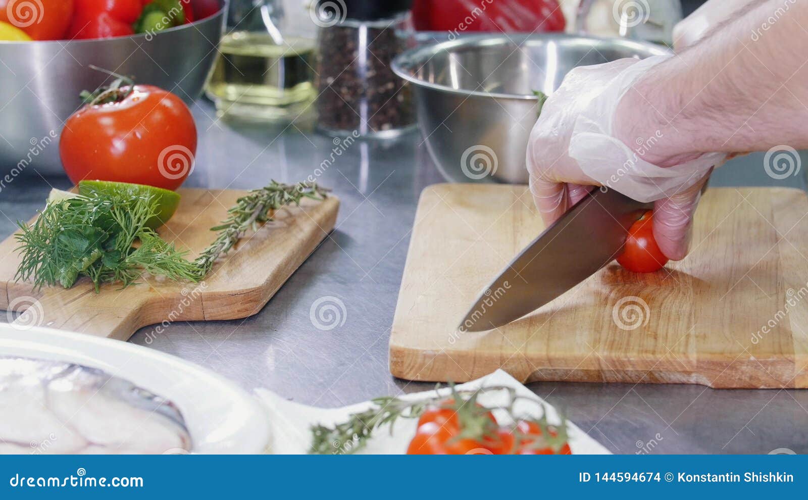Restaurant Kitchen. a Chef Cutting the Tomato Stock Photo - Image of ...