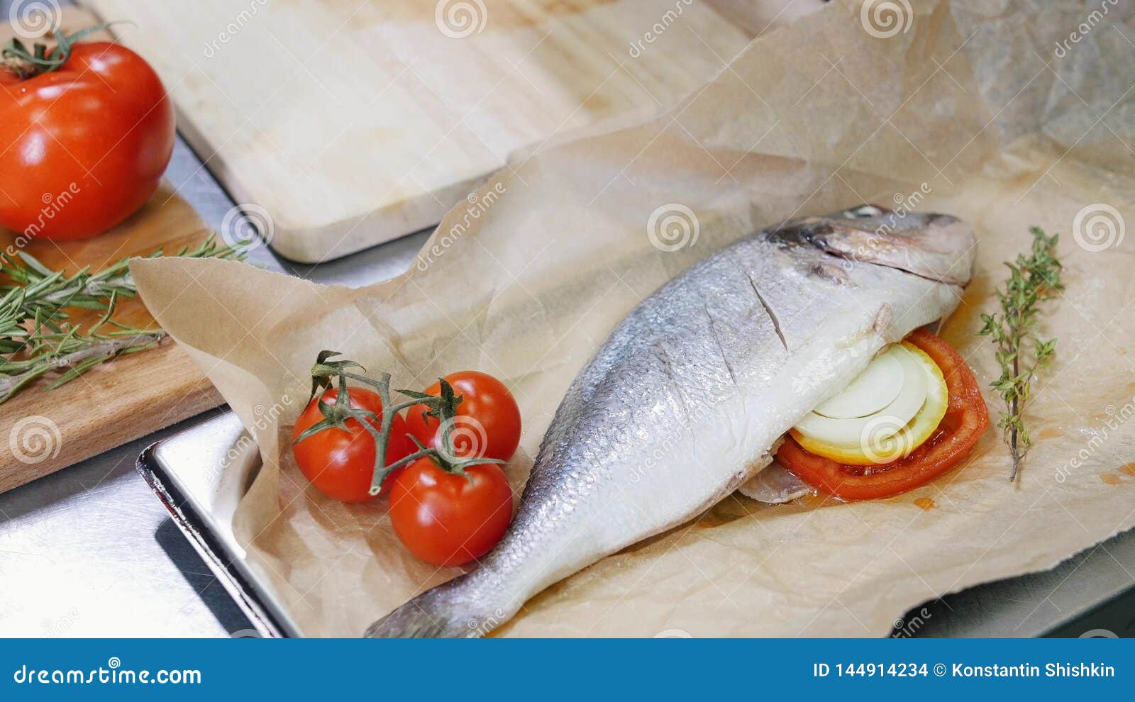 Restaurant Kitchen. a Fish Filled with Vegetables on the Table Stock ...