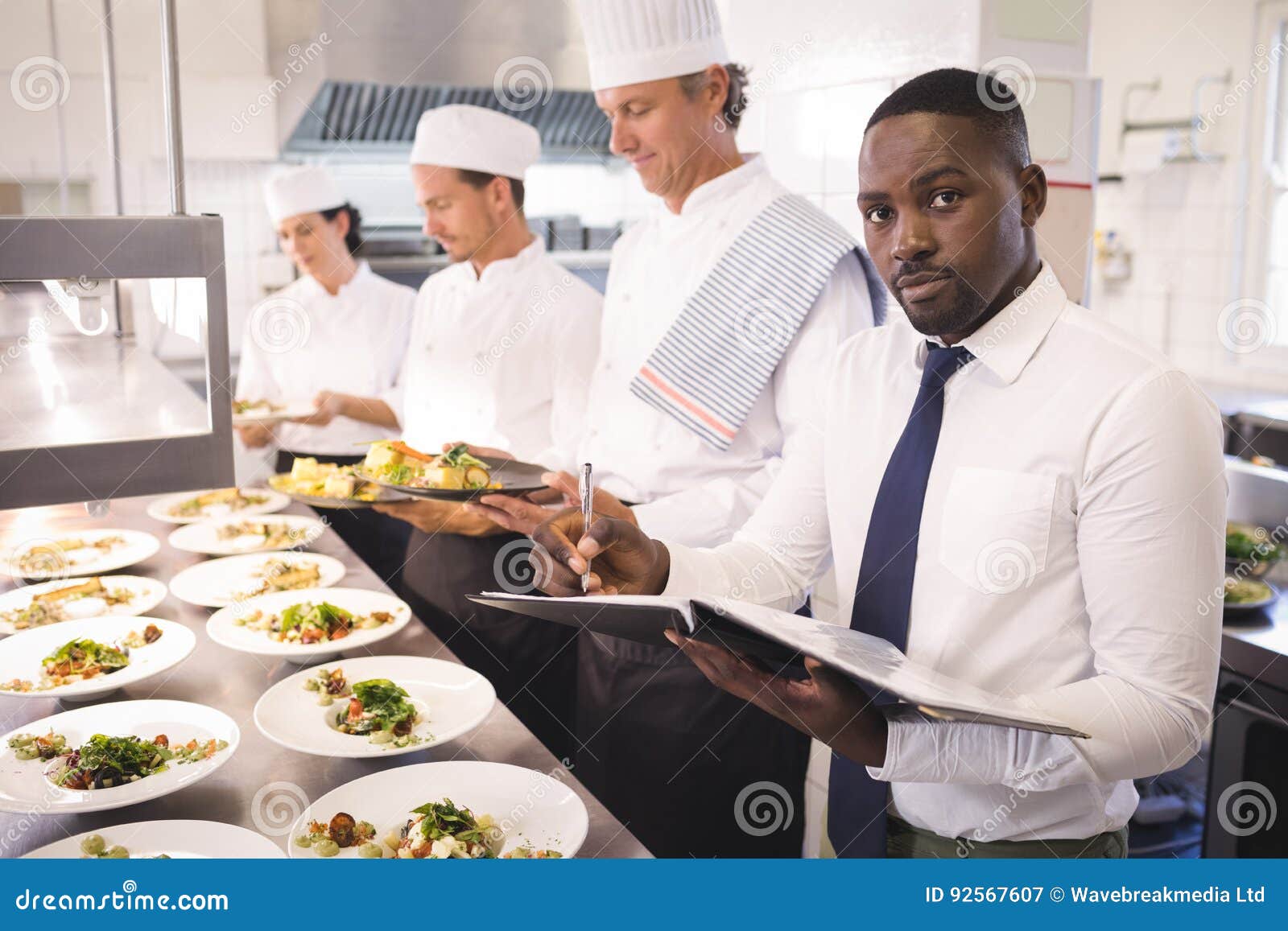 Restaurant Manager with His Kitchen Staff Stock Image - Image of ...