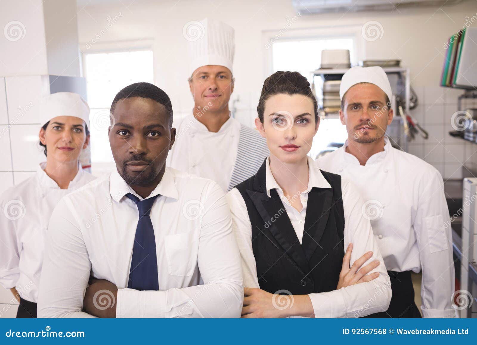 Restaurant Manager with His Kitchen Staff Stock Photo - Image of arms ...