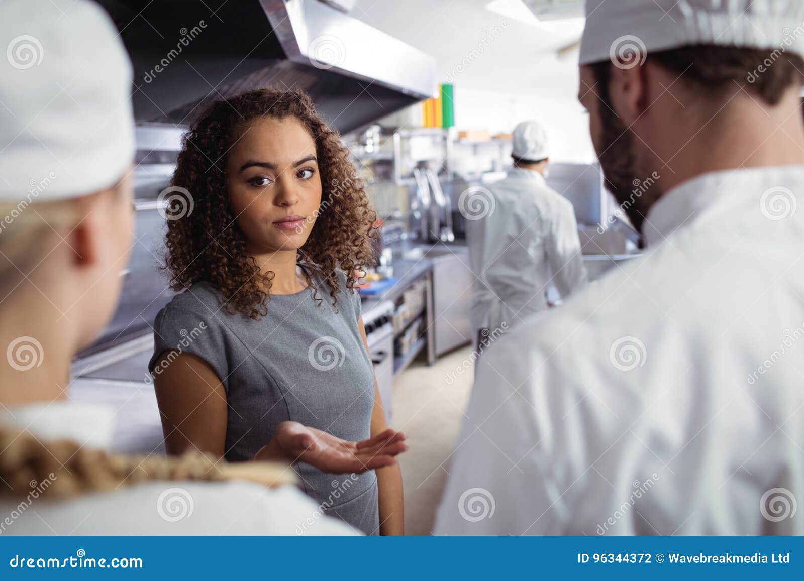 Restaurant Manager Interacting with His Kitchen Staff Stock Photo ...