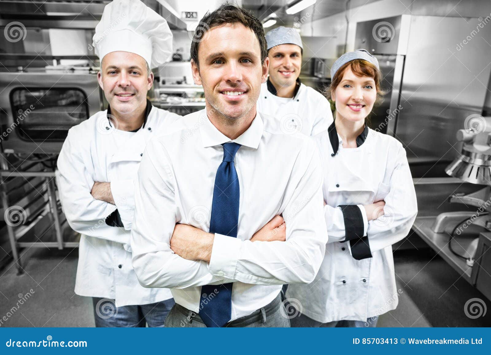 Restaurant Manager Posing in Front of Team of Chefs Stock Image - Image ...